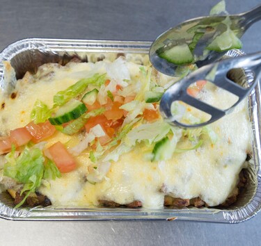 Amsterdammers proberen Rotterdamse kapsalon te kapen - 24Kitchen